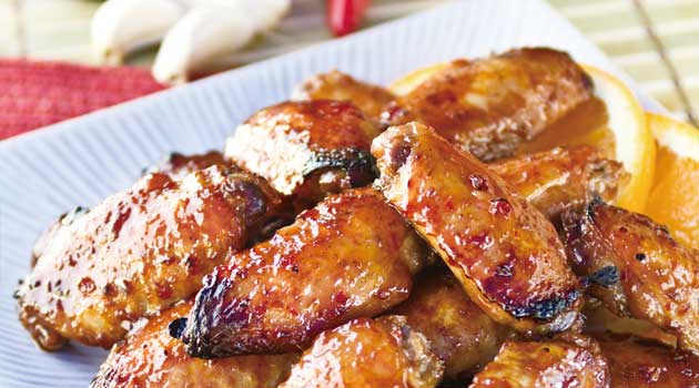 Spicy Chicken Wings with Sriracha Chili Sauce Recipe - Flavorite