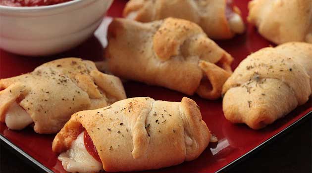 Pepperoni Pizza Crescent Roll-Ups Recipe - Flavorite